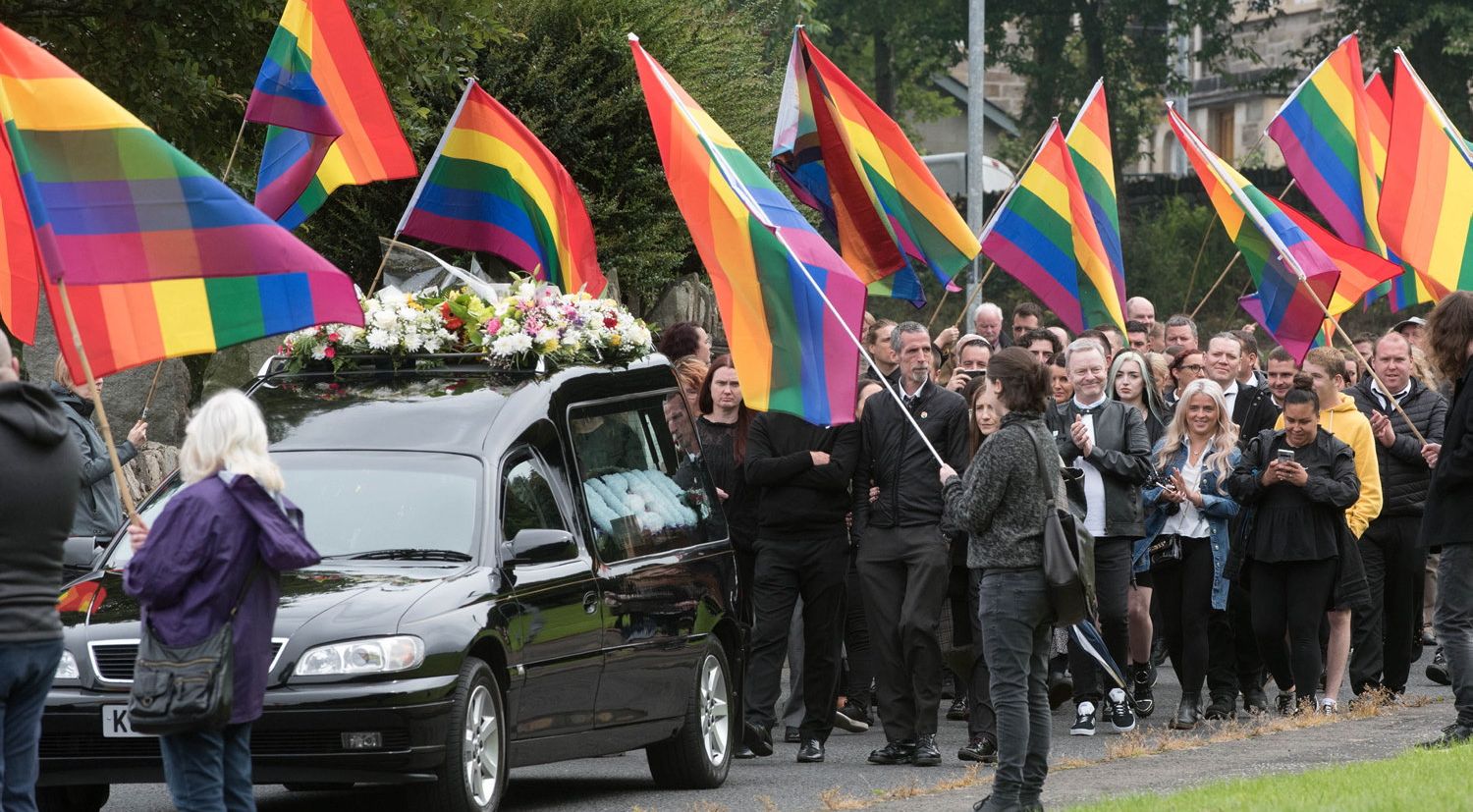 Mother and daughter together again, mourners at funeral of gay rights ...