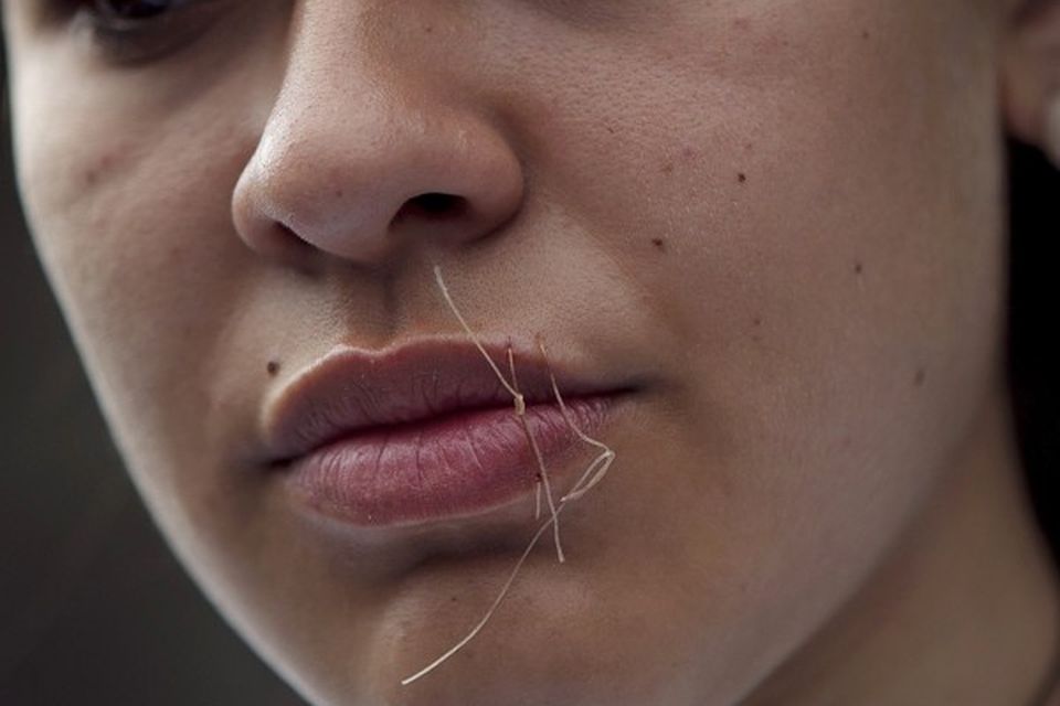 Students stitch lips in protest | BelfastTelegraph.co.uk
