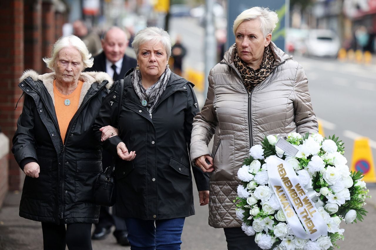 Shankill Road stands silent in memory of those who lost their lives in ...