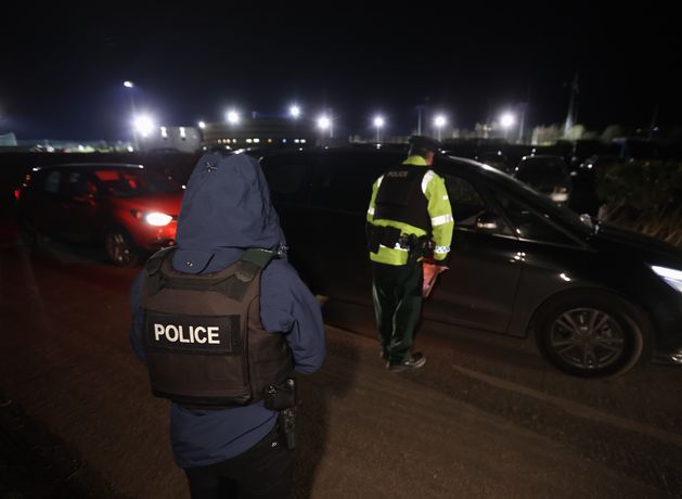 Police given more time to question two men over detective’s shooting in ...