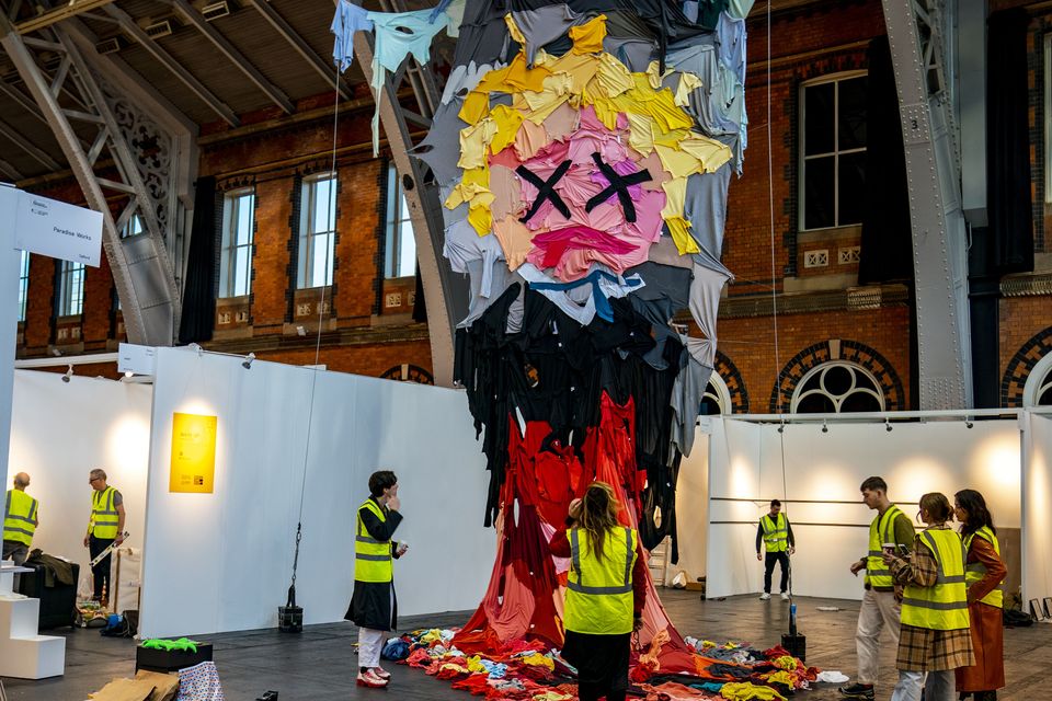 Students send climate message with giant Boris Johnson artwork made ...