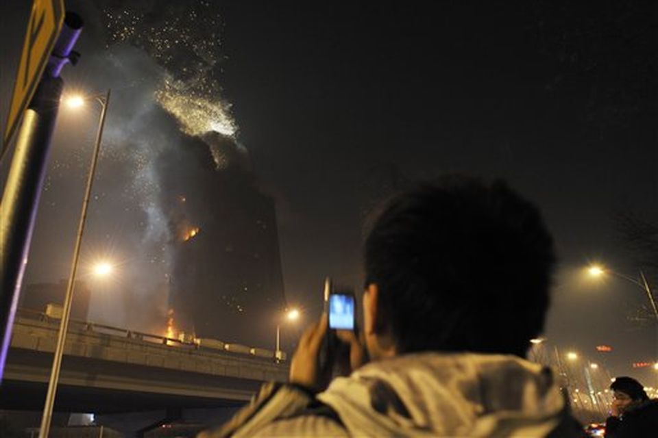In Pictures & Video: Firefighter killed as fire engulfs Beijing ...