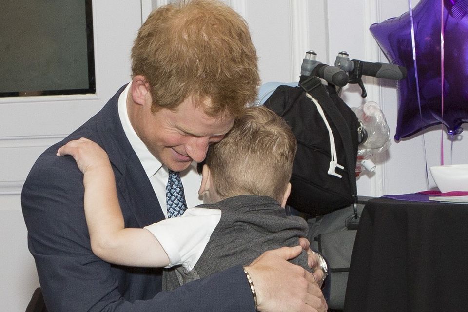 Young fan greets Harry with hug | BelfastTelegraph.co.uk