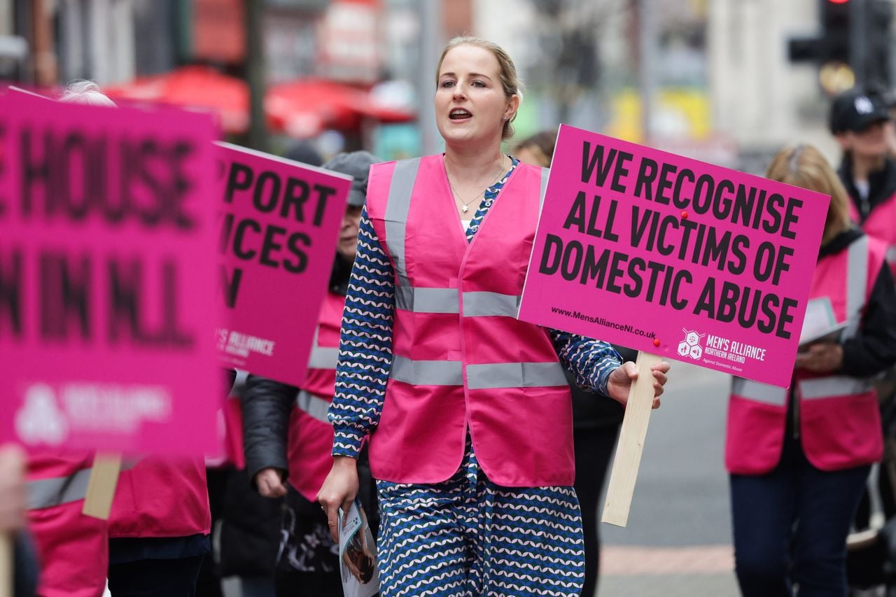 Women march in Belfast to highlight struggles faced by male victims of ...