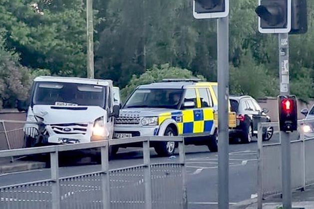Two men arrested following police pursuit in west Belfast ...