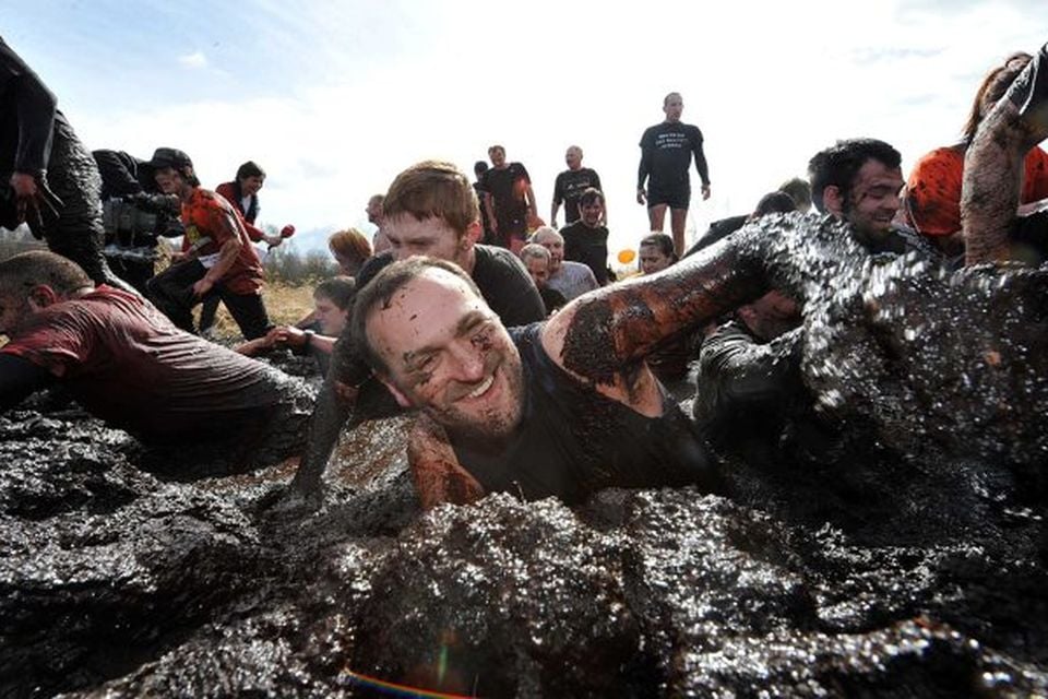 Runners muck in for charity at wacky race | BelfastTelegraph.co.uk
